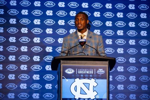 : North Carolina Tarheels quarterback Conner Harrell speaks with the ...