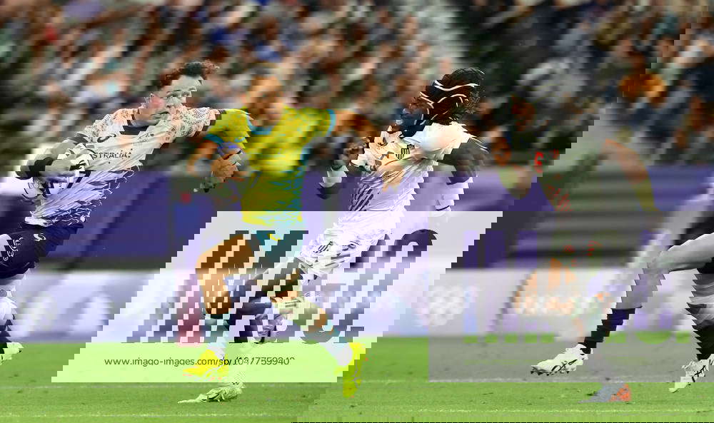 OLY24 RUGBY SEVENS, Hayden Sargeant of Australia (left) competes with ...