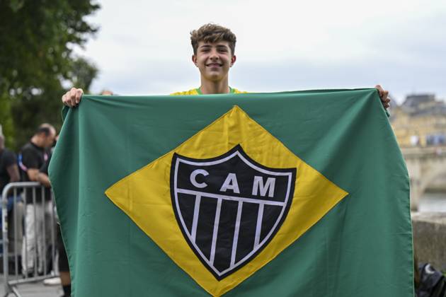 Brazilian spectator arrives for the Opening Ceremony of the XXXIII ...