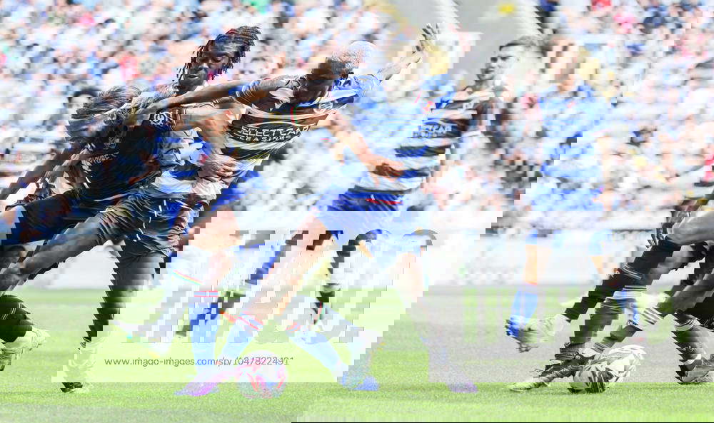 Lucas Andersen of QPR battles with Amadou Mbengue of Reading Reading v ...