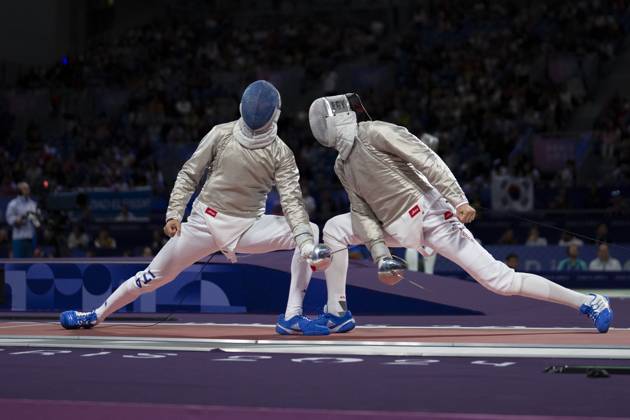 PARIS, FRANCE JULY 27 Luigi Samele of Italy L against Mohamed Amer of ...
