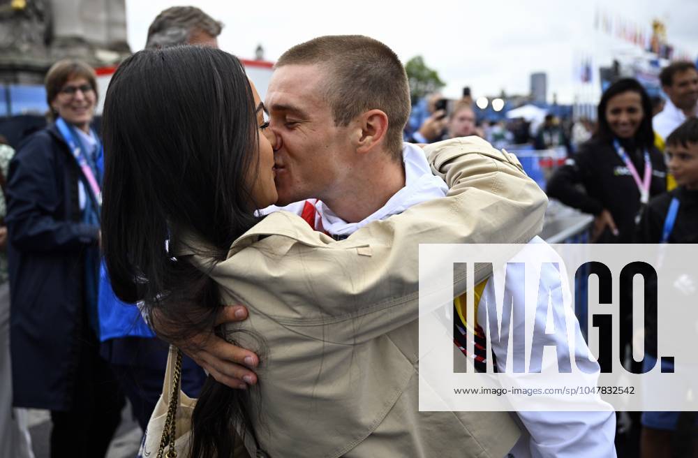 Belgian Remco Evenepoel kisses his wife Oumaima Oumi Rayane after ...