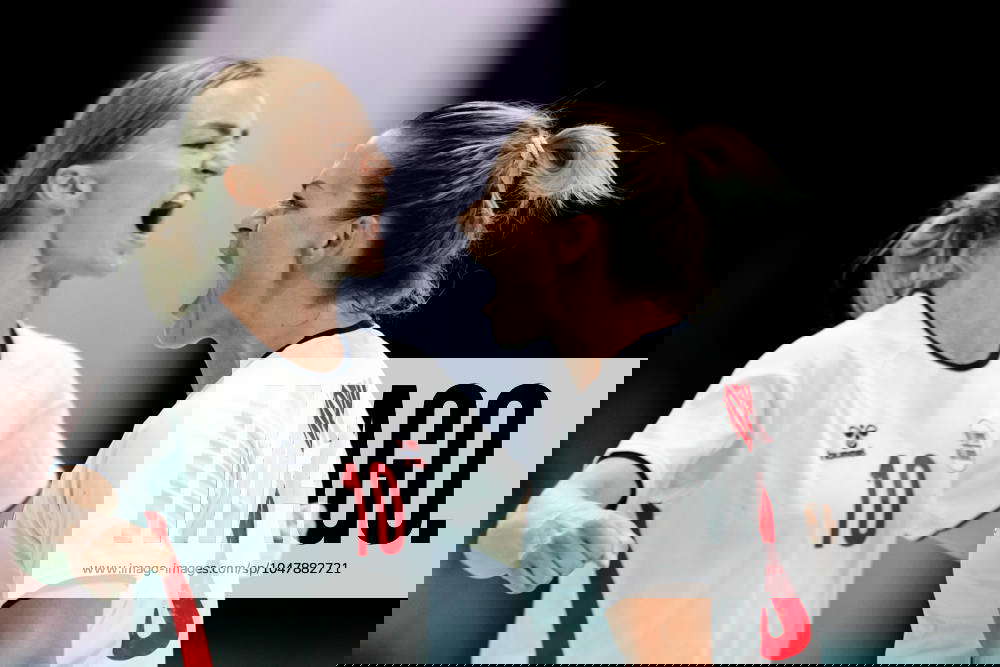 240728 Stine Bredal Oftedal and Nora Mork of Norway celebrate in womens preliminary round handball