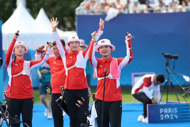 PARIS, Yang Xiaolei, An Qixuan, and Li Jiaman of China react during the Women s Team Gold Medal