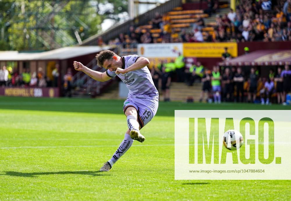 Luke McBeth of Partick Thistle beats Motherwell goalkeeper Aston ...