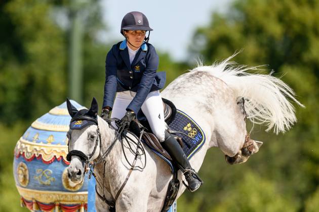 Louise Romeike of Sweden on horse Caspian 15 competes in equestrian ...