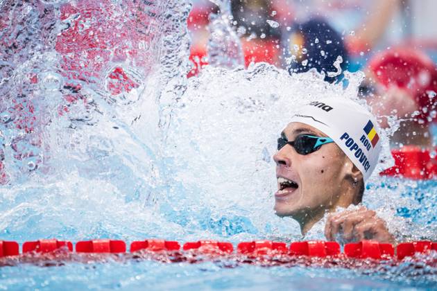 David Popovici of Romania competes in the mens 200 meters freestyle ...