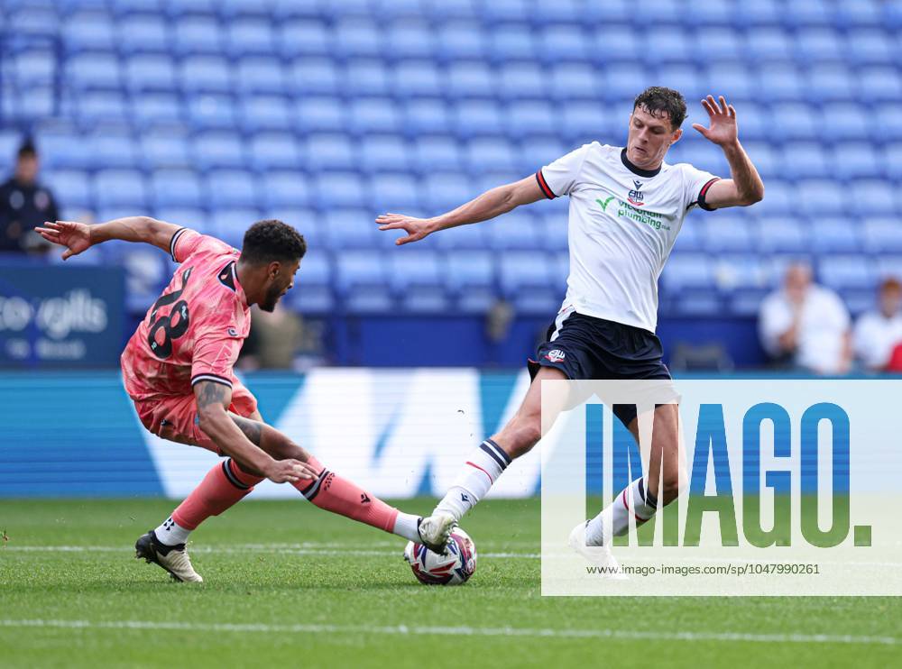 Josh Laurent of Stoke City and Eoin Toal of Bolton Wanderers Bolton ...