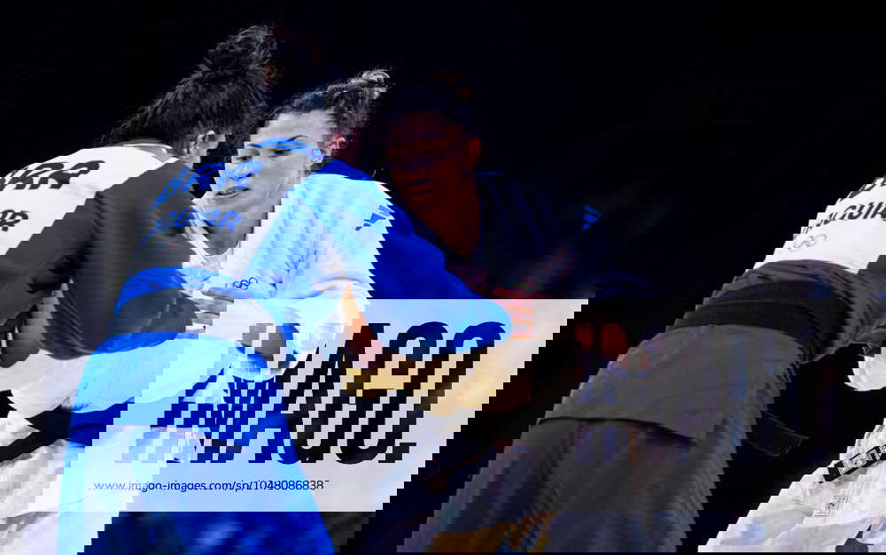 PACUT KLOCZKO Beata Poland, white vs NIRAGIRA Ange Ciella Burundi, blue ...