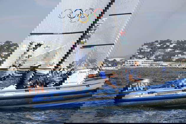 Sinem Kurbay and Akseli Keskinen of Finland wait for competing in mixed ...