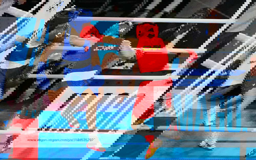 Olympics: Boxing Aug 9, 2024; Paris, France; Wu Yu (CHN) strikes Buse ...