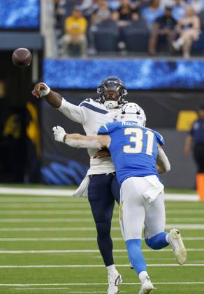 August 10, 2024 Seattle Seahawks quarterback PJ Walker (15) scrambles ...