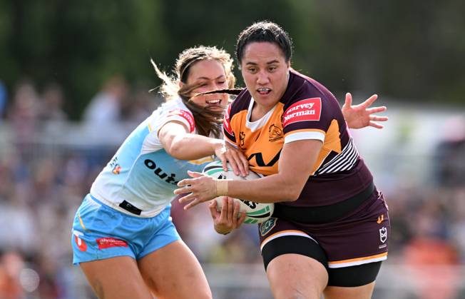 NRLW BRONCOS TITANS, Tazmin Rapana (right) of the Broncos gets past ...