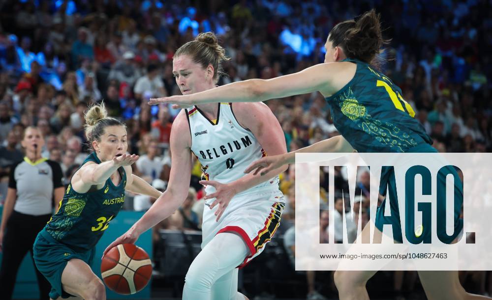 Belgium s Emma Meesseman and Australia s Marianna Tolo fight for the ...