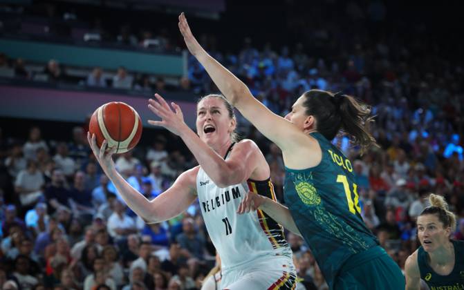 Belgium s Emma Meesseman and Australia s Marianna Tolo fight for the ...