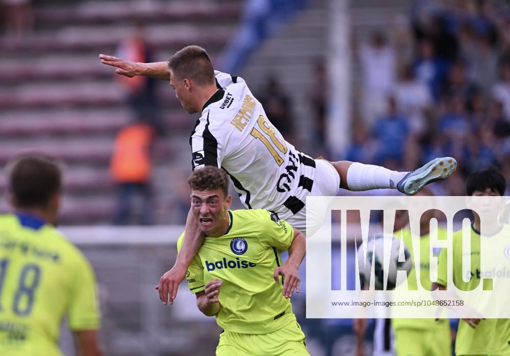 Charleroi s Daan Heymans and Gent s Mathias Delorge fight for the ball ...