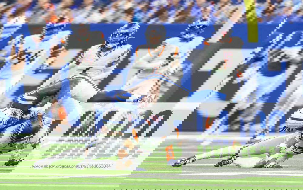 August 11, 2024: Denver Broncos safety Devon Key (26) makes the tackle ...