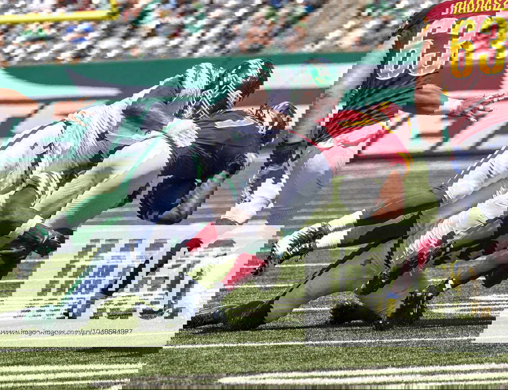 New York Jets safety Jarius Monroe (39) and defensive tackle Tanzel ...