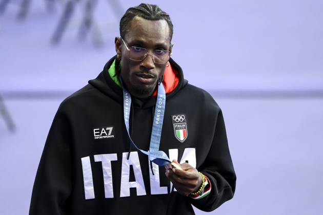 Andy Diaz Hernandez of Italy looks on holding a medal after the medal ...