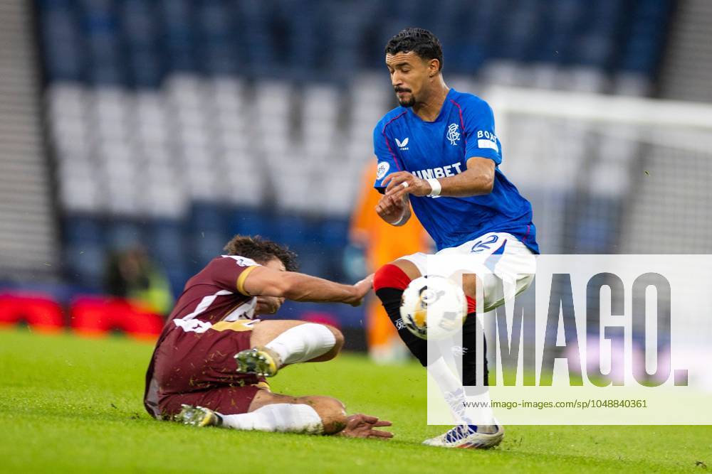 Jefte of Rangers battles for the ball during the second round of the ...