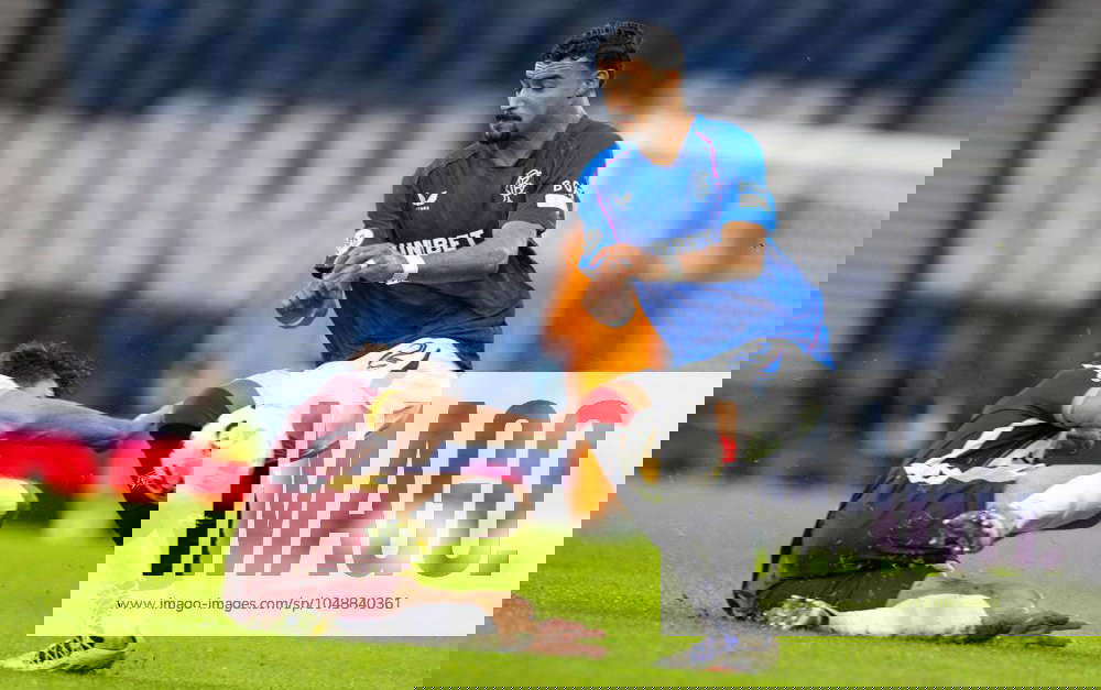 Jefte of Rangers battles for the ball during the second round of the ...