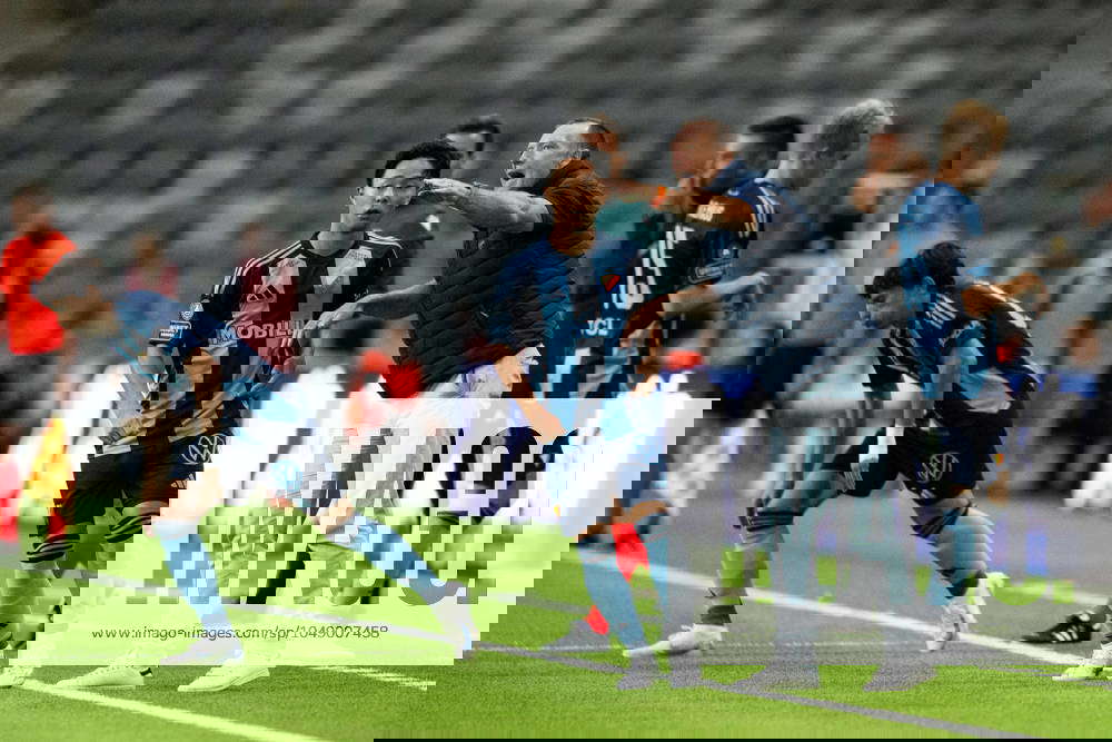 240822 Keita Kosugi of Djurgarden and head coach Kim Bergstrand during ...