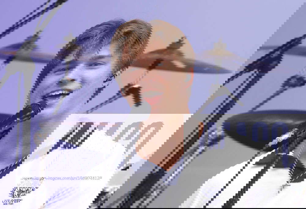 Alex Sampson performs on stage outside of Arthur Ashe Stadium at Arthur ...