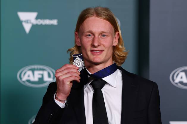 2024 AFL AWARDS, Oliver Dempsey poses with the Rising Star medal during ...