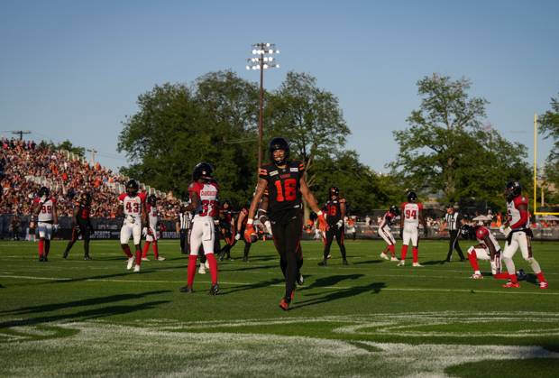 Victoria, Bc, CANADA: B.C. Lions Justin McInnis, back right, makes a ...