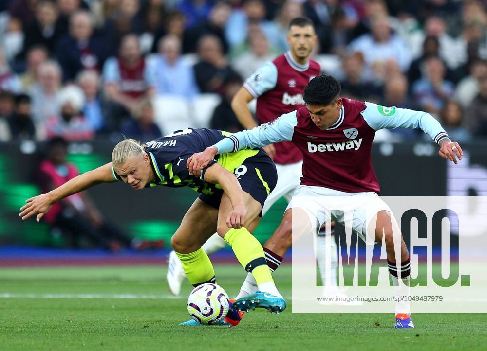 Edson Alvarez of West Ham United competes for the ball with Erling ...