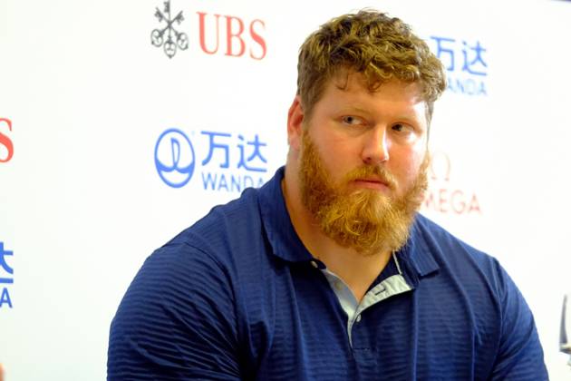 - American track and field athlete shot putter and three consecutive ...