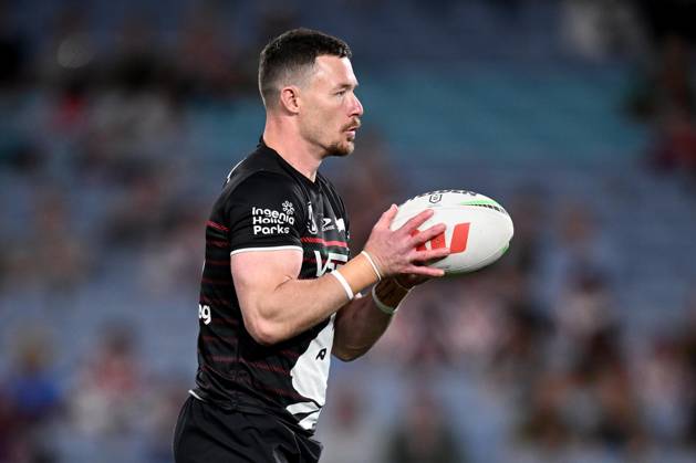 NRL RABBITOHS ROOSTERS, Damien Cook of the Rabbitohs (centre) is ...