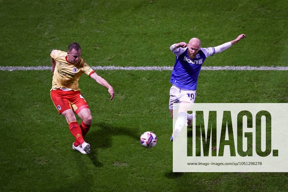 Kieran Green of Grimsby Town clears under pressure from Jonathan ...