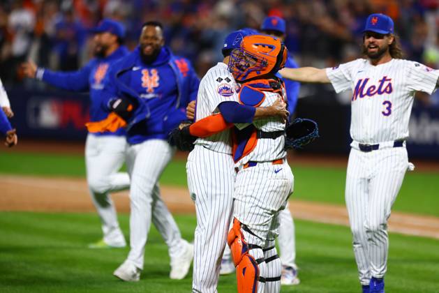 NLDS Phillies Vs. Mets The New York Mets celebrate their 4-1 victory in Game 4 of a baseball NL