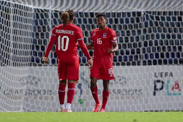 Gerson Rodrigues Luxembourg 10 discusses with Scott McTominay Scotland ...