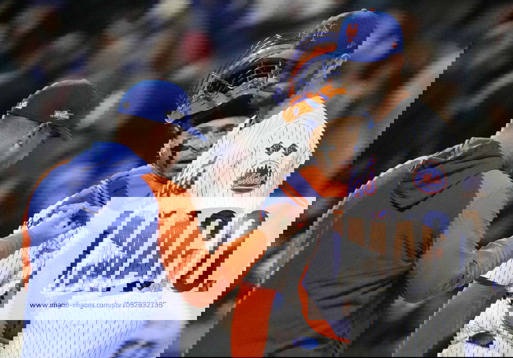 New York Mets starting pitcher David Peterson is taken out of the game ...