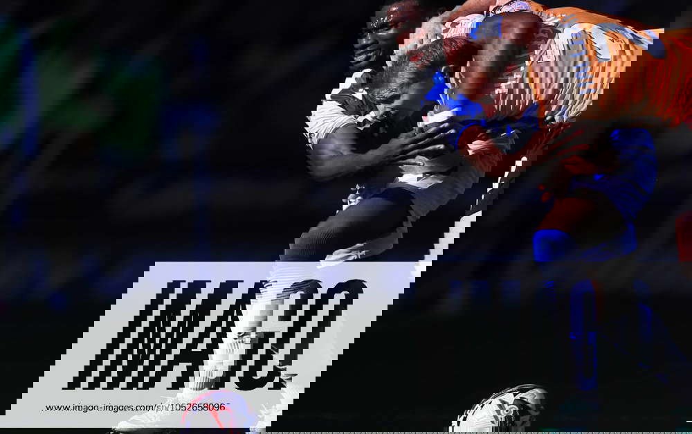 Brad Halliday of Bradford City (R) vies with Joseph Gbode of Gillingham ...