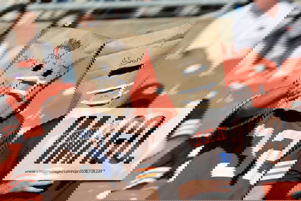 Cleveland Browns fans wear bags over their heads during the fourth ...