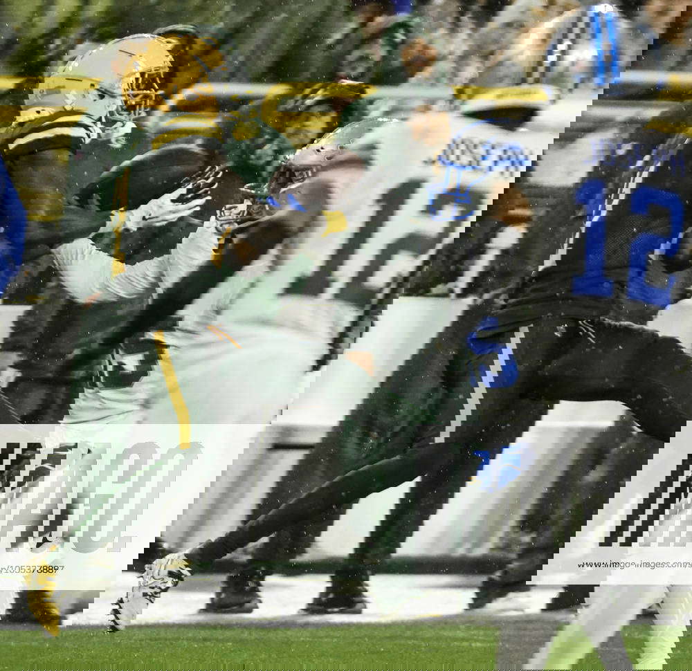 Green Bay Packers wide receiver Jayden Reed (L) catches a pass in front ...