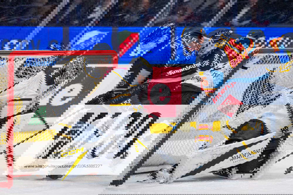 Djurgardens Hugo Blixt and Södertäljes goalkeeper Frans Tuohimaa during ...