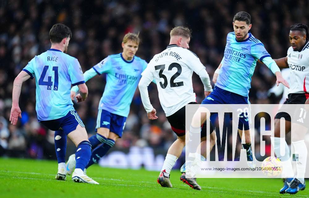 Emile Smith Rowe of Fulham surrounded by Arsenal midfielders Fulham v ...