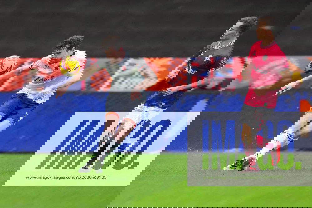 Tom Holmes (29) of Luton Town and Scott Twine (10) of Bristol City ...