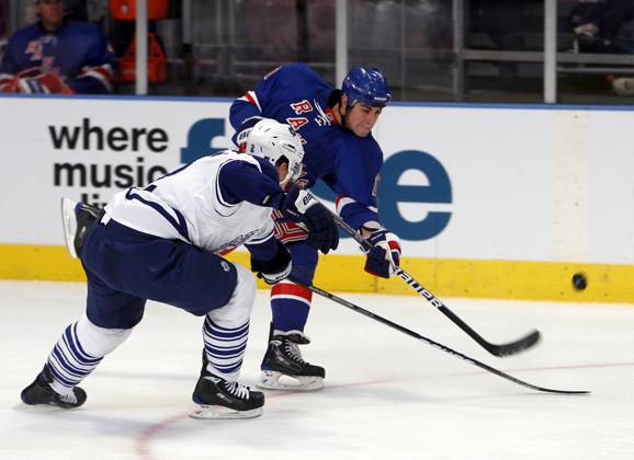Rangers vs. Leafs New York Rangers center Brandon Dubinsky, right ...