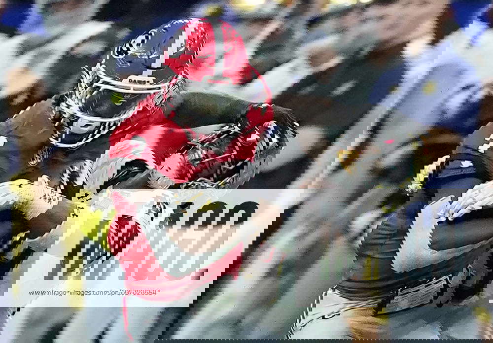 Georgia running back Nate Frazier (3) tries to break a tackle by Notre ...