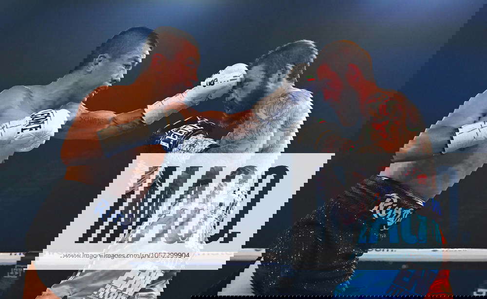 BOXING OPETAIA NYIKA, Runqi Zhou strikes Tony Ingram during their ...