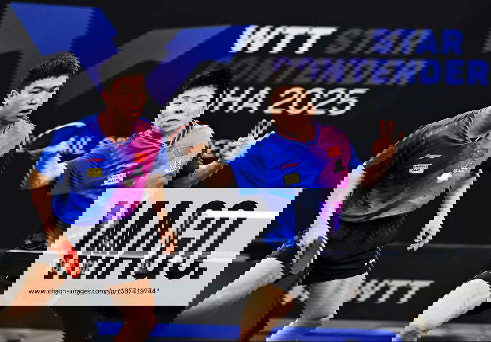 DOHA, Jan. 11, 2025 -- Xu Yingbin Xiang Peng compete during the men s ...