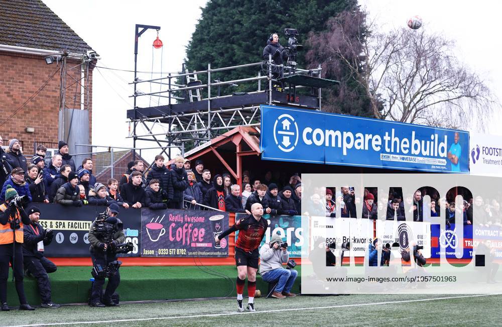 Tom Tonks of Tamworth takes a throw in Tamworth v Tottenham Hotspur ...