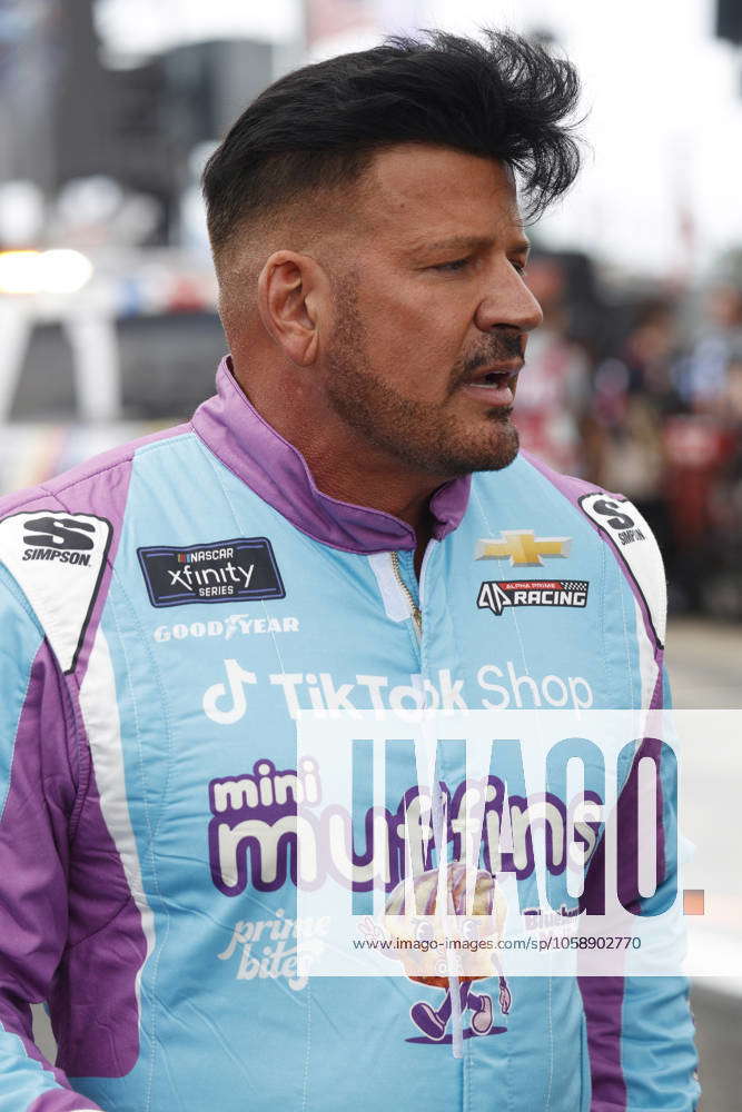 DAYTONA BEACH, FL - FEBRUARY 15: Caesar Bacarella walks down pit road ...