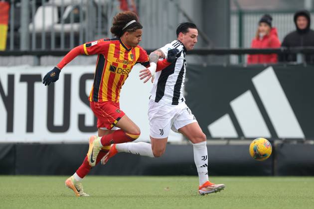 Vinovo, Italy, 19th February 2025. Elijah Scott of US Lecce tussles ...
