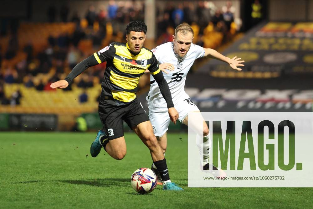 Tyler Smith of Barrow and Ryan Croasdale of Port Vale Port Vale v ...
